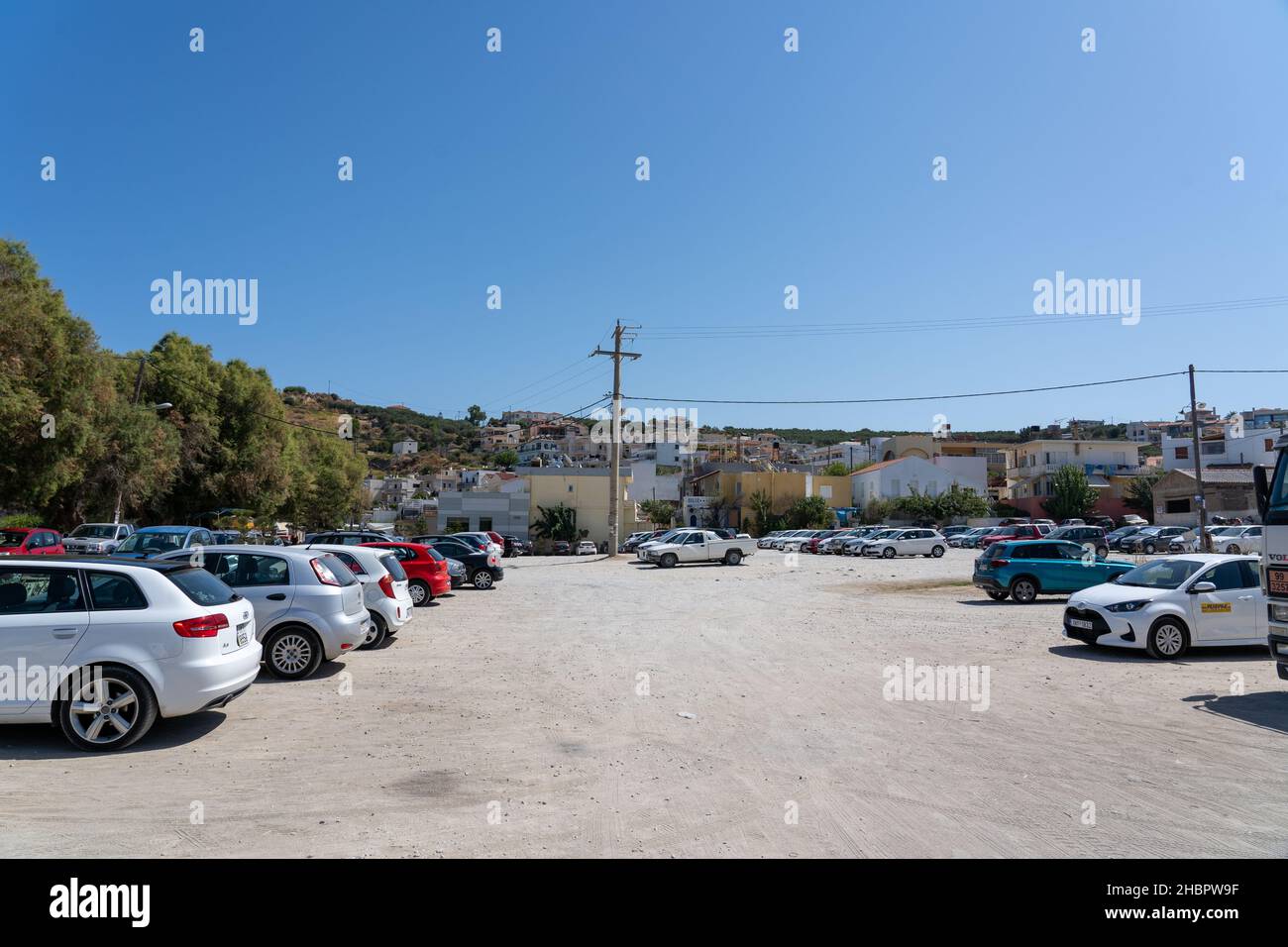 Parking lot in Kalives on Crete, Greece Stock Photo - Alamy