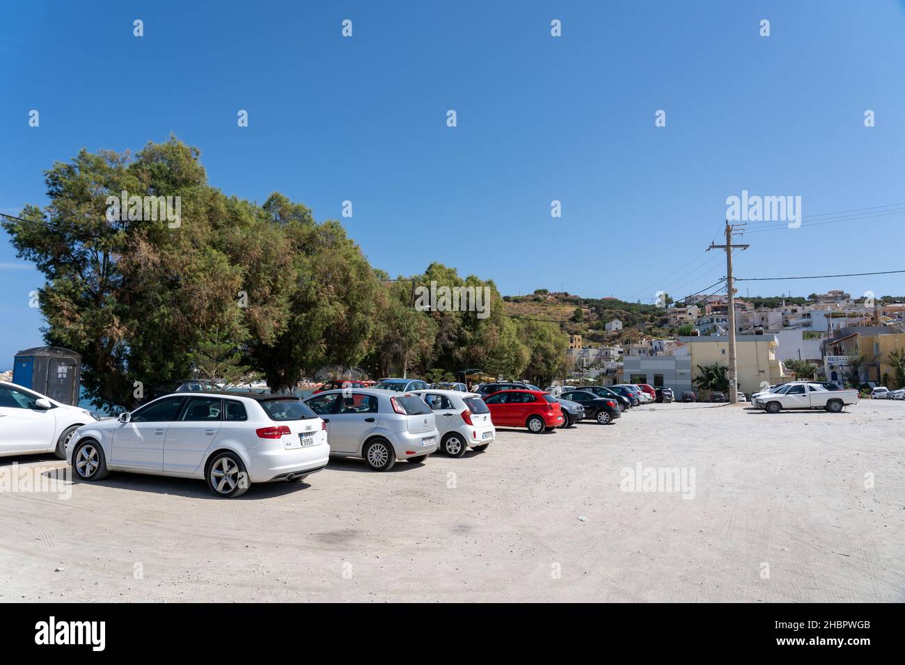 Parking lot in Kalives on Crete, Greece Stock Photo - Alamy
