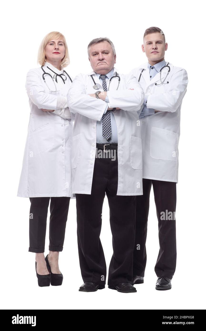qualified doctors colleagues standing together. isolated on a white ...