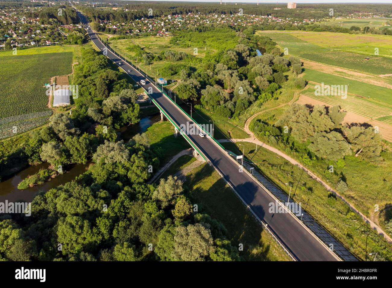 Aerial view of Varshavskoe A-130 highway crossing the Protva river ...