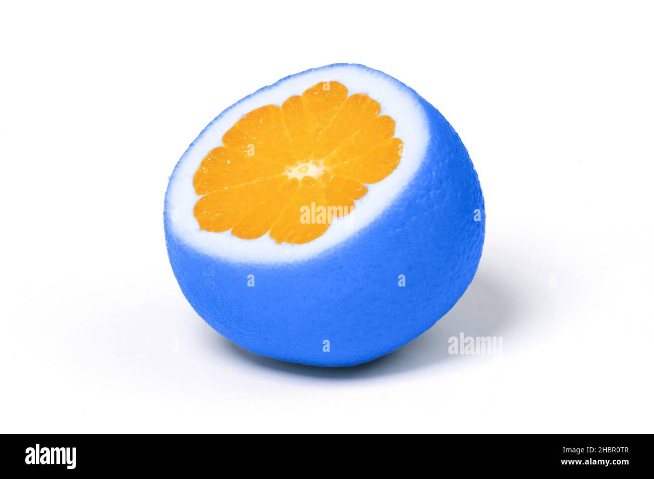 Weird looking cut of blue orange fruit, isolated Stock Photo - Alamy