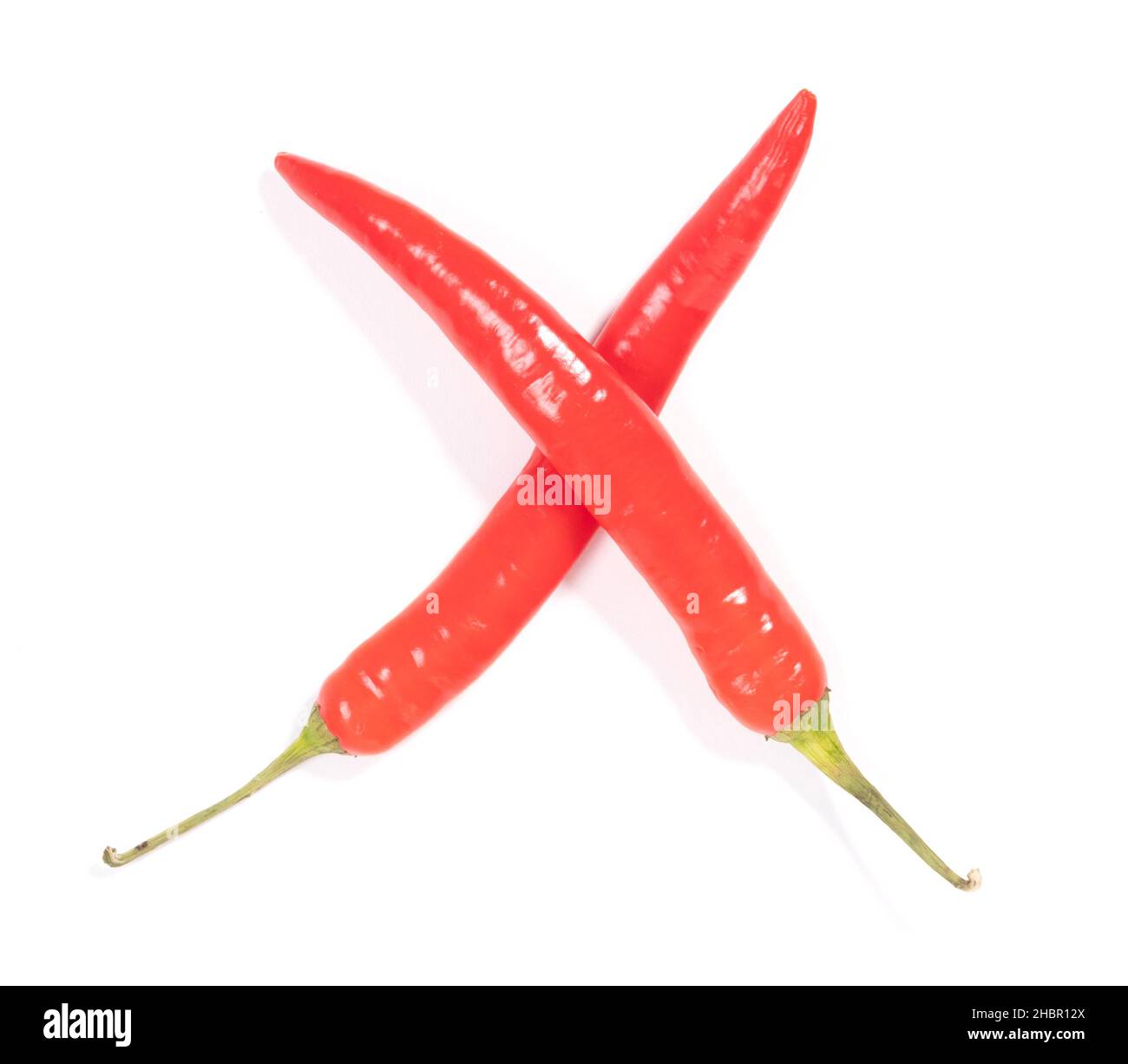 Red hot chili peppers isolated on a white background - Cross Stock ...