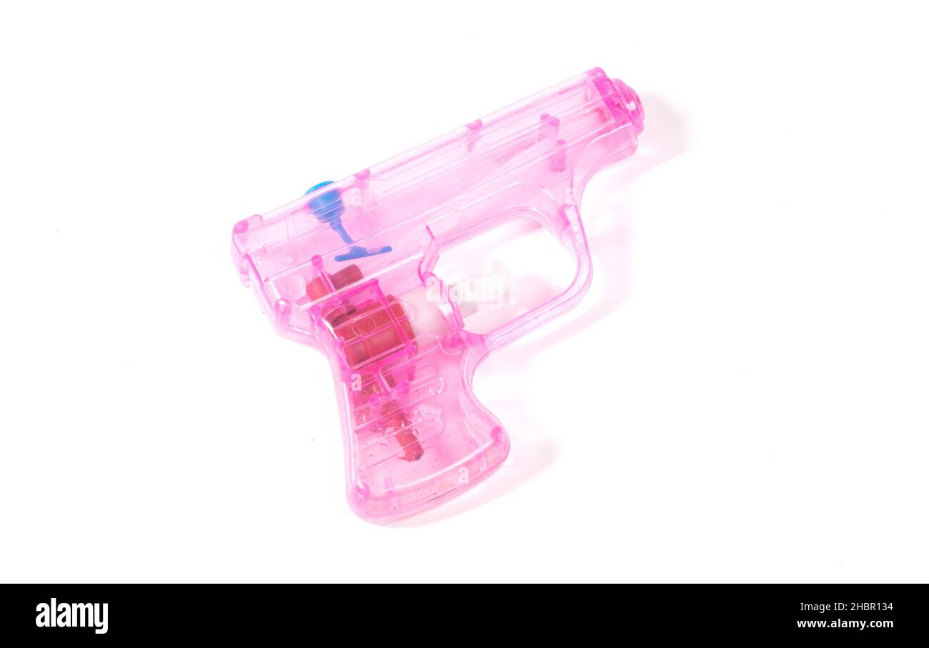 SImple pink small water pistol isolated on white background Stock Photo ...
