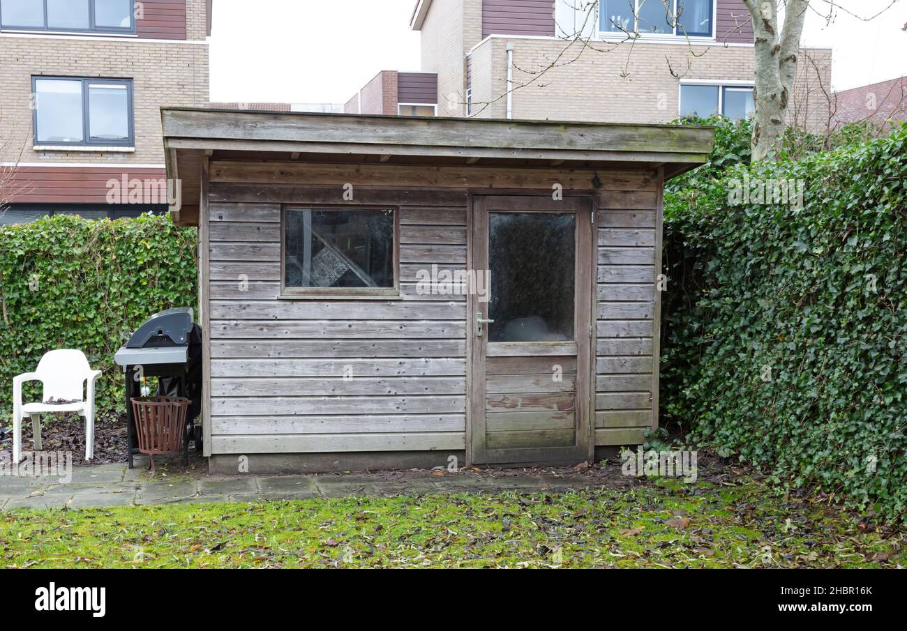 Old run down worn out rotting garden shed, the Netherlands Stock Photo ...