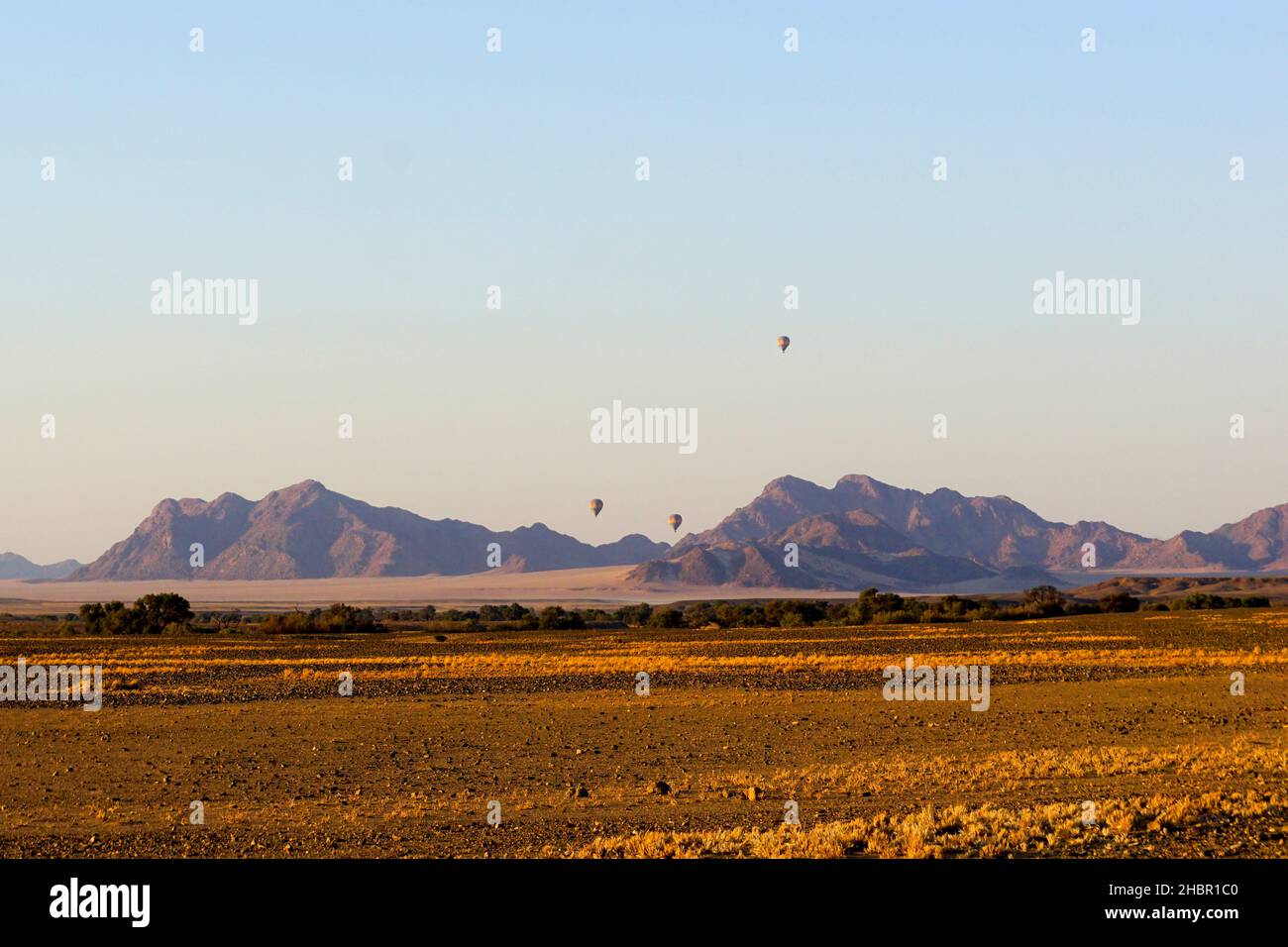Hot air balloons in the Namibian desert, Africa Stock Photo - Alamy