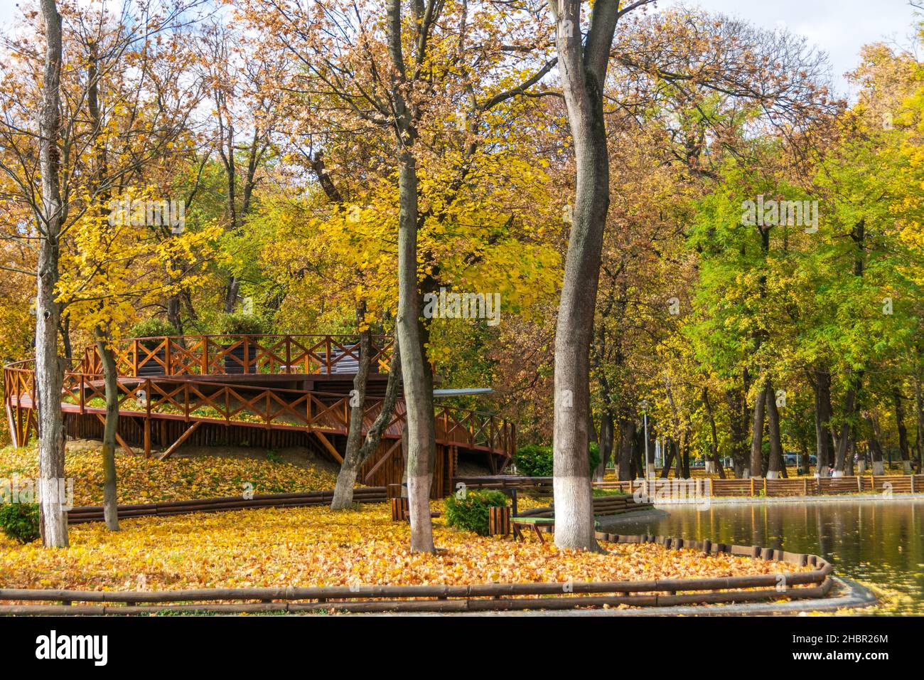 The lake from the Roman park in the autumn surrounded by colored trees ...