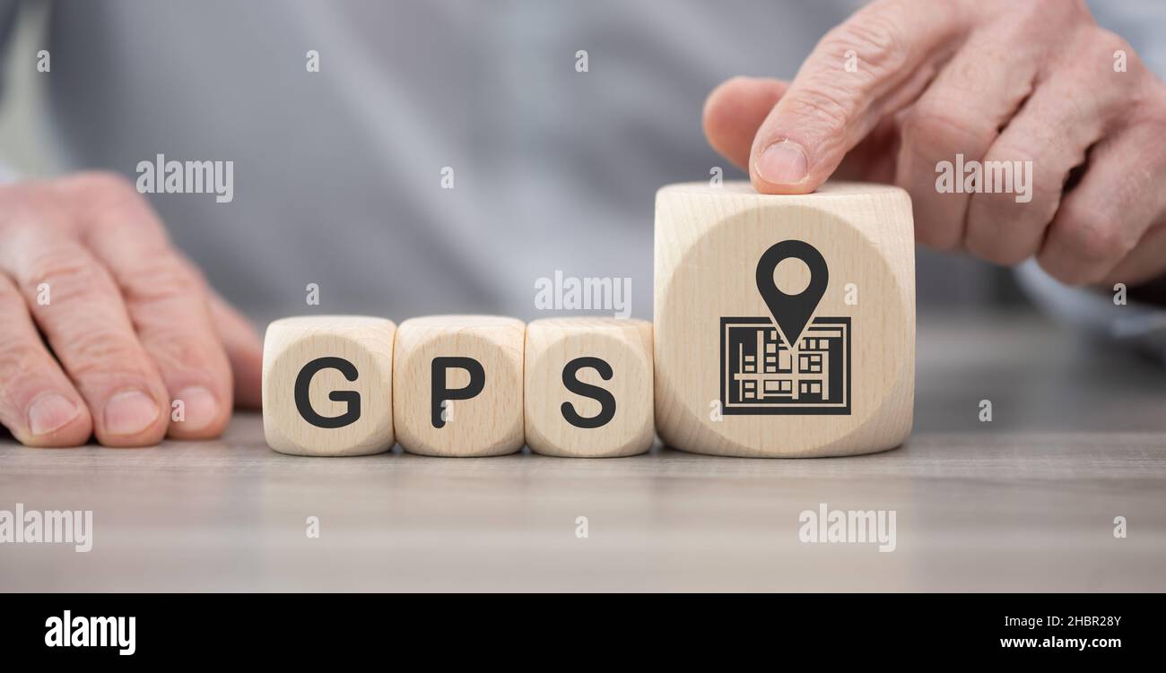 Wooden blocks with symbol of gps concept Stock Photo - Alamy