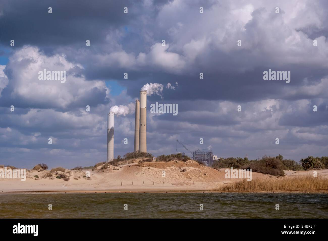 Smoke plume from chimney of the coal-fired power plant named Rutenberg ...