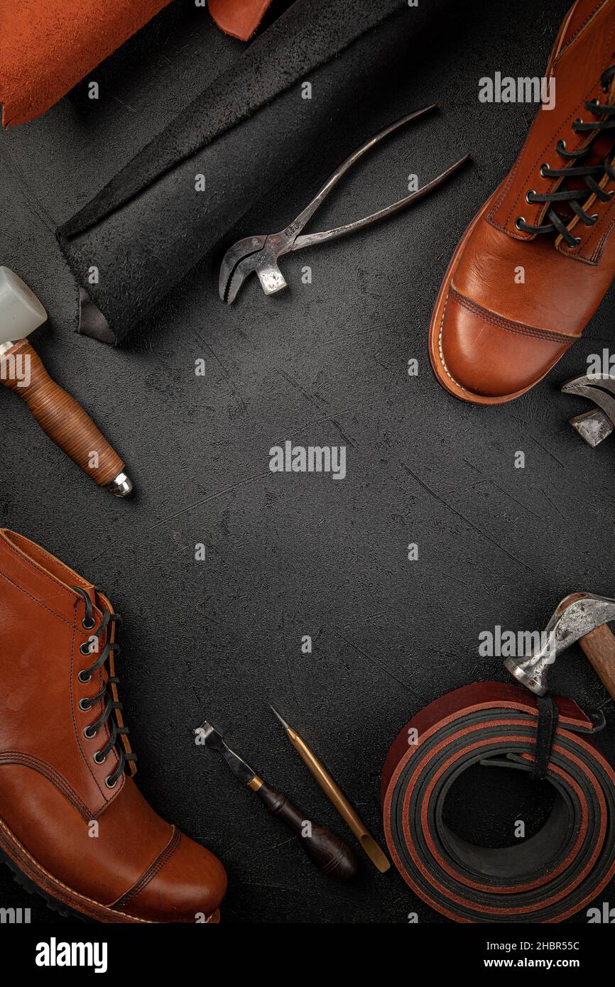 Leather cobbler crafting workshop place with tools Stock Photo - Alamy