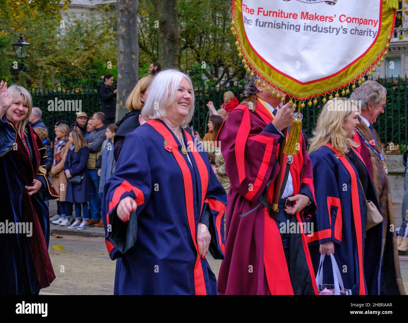 Anne Woodward smiles as she marches with the Furniture Maker’s Company ...