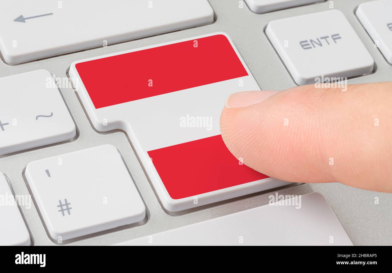 A keyboard with a labeled button - Flag of Austria Stock Photo - Alamy