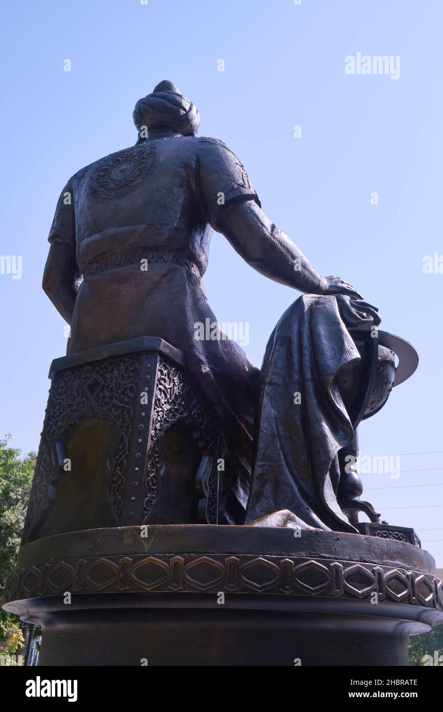 The back of a bronze statue of the famous astronomer Mirzo Ulugbek. In ...