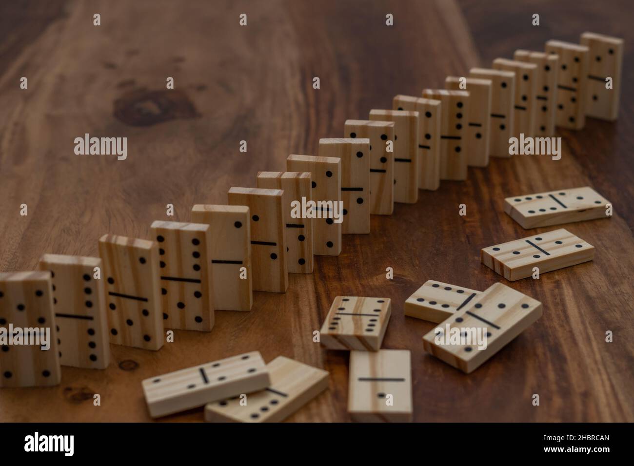 Dominoes lined up in row hi-res stock photography and images - Alamy