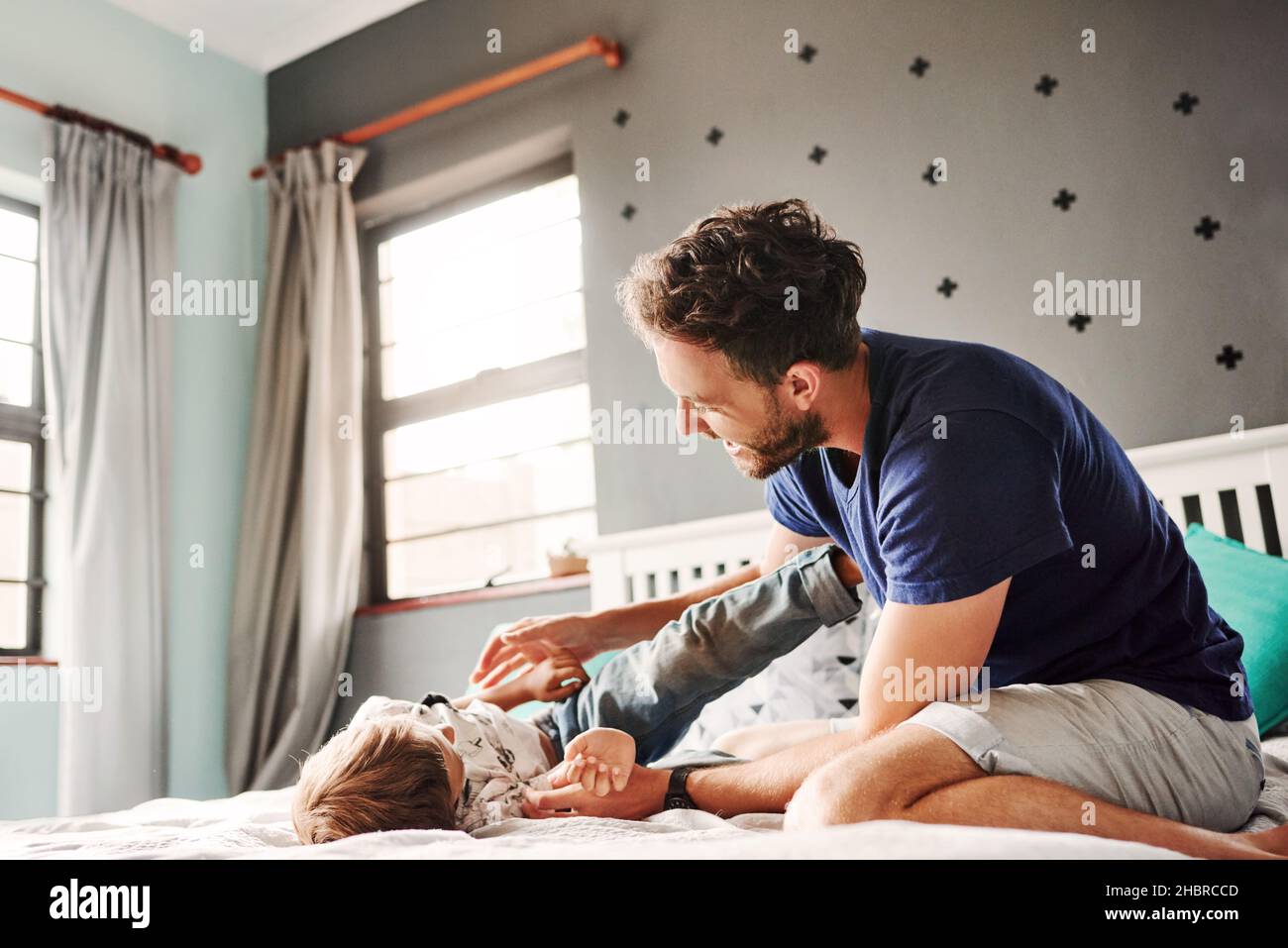 Dad tickling son hi-res stock photography and images - Alamy