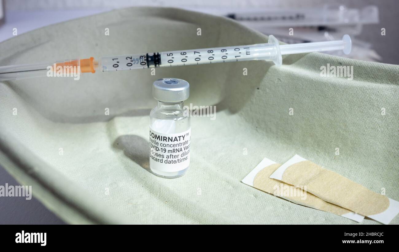 A vial with Pfizer Biontech COVID-19 mRNA vaccine, Comirnaty, booster ...