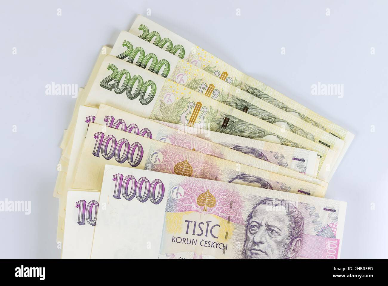 Czech koruna currency banknotes on white background Stock Photo - Alamy