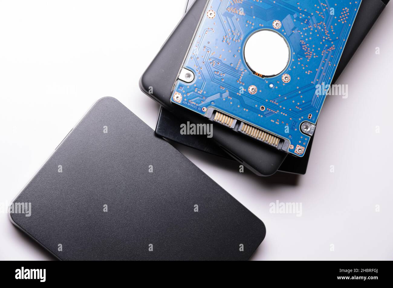 Portable external hard disc drives on white background Stock Photo - Alamy