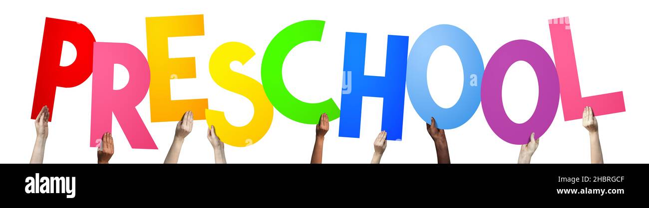 Preschool - human hands holding colorful letters Stock Photo - Alamy
