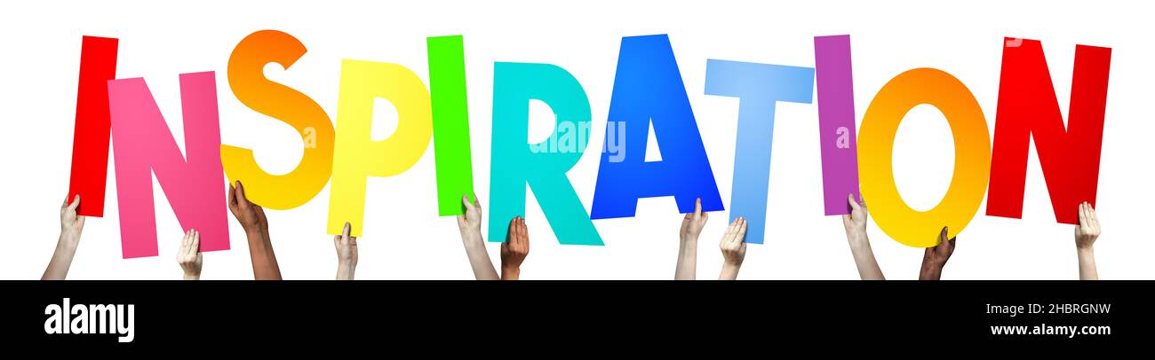 Inspiration - human hands holding colorful letters Stock Photo - Alamy