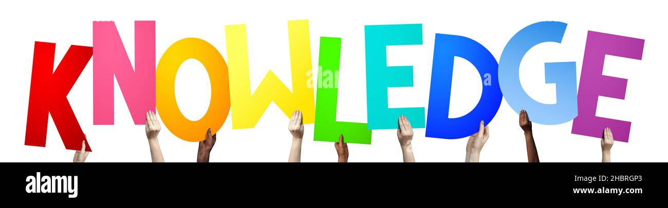 Knowledge - human hands holding colorful letters Stock Photo - Alamy