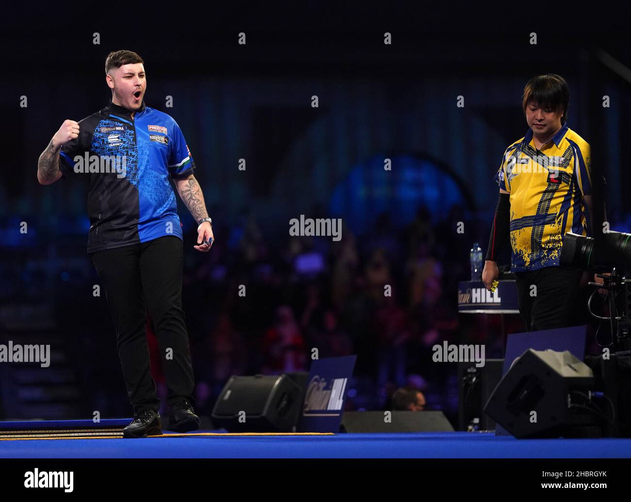 Lewy Williams (left) celebrates against Toyokazu Shibata (right) during ...