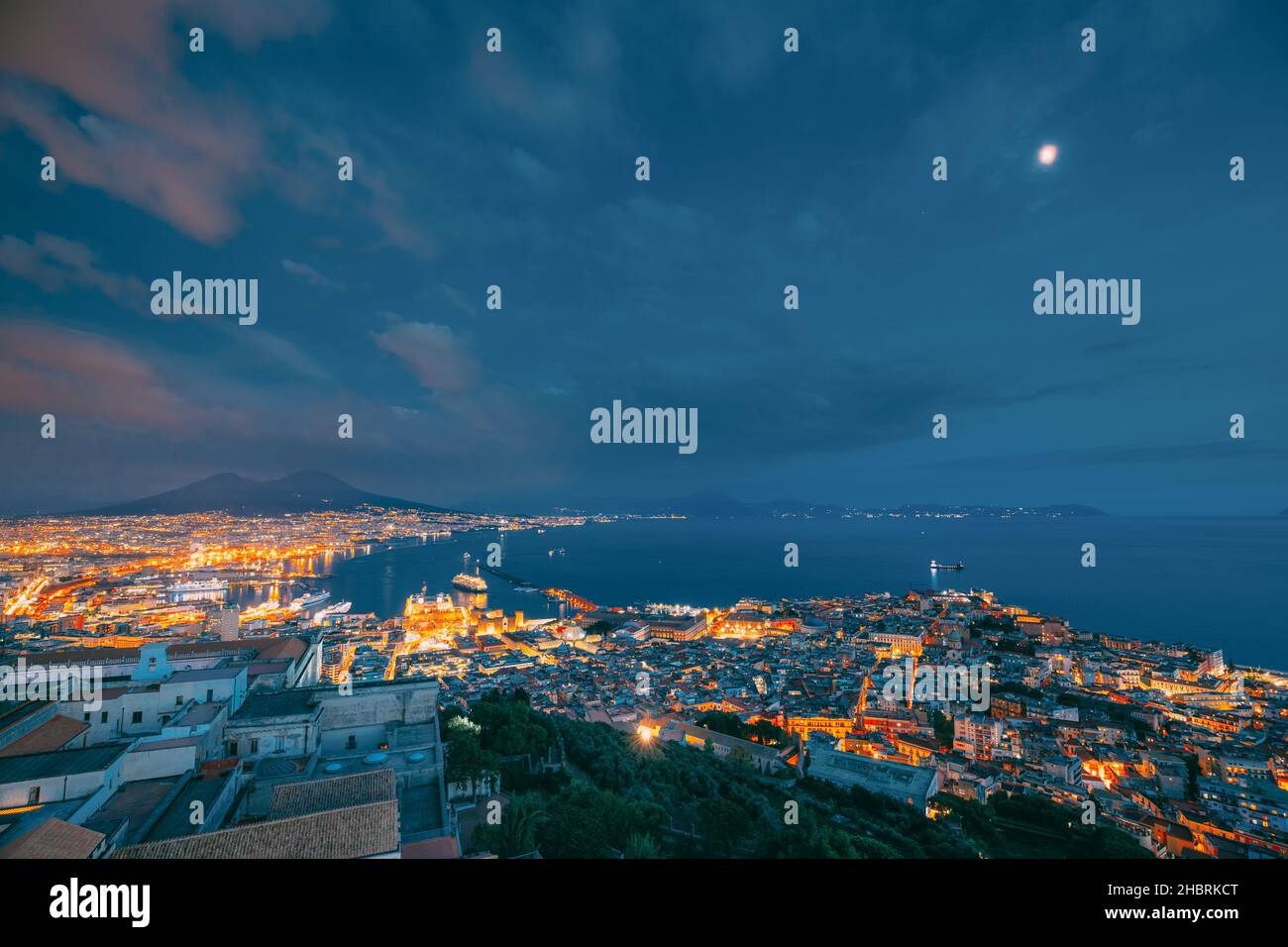 Naples, Italy. Skyline Cityscape In Evening Lighting. Tyrrhenian Sea ...