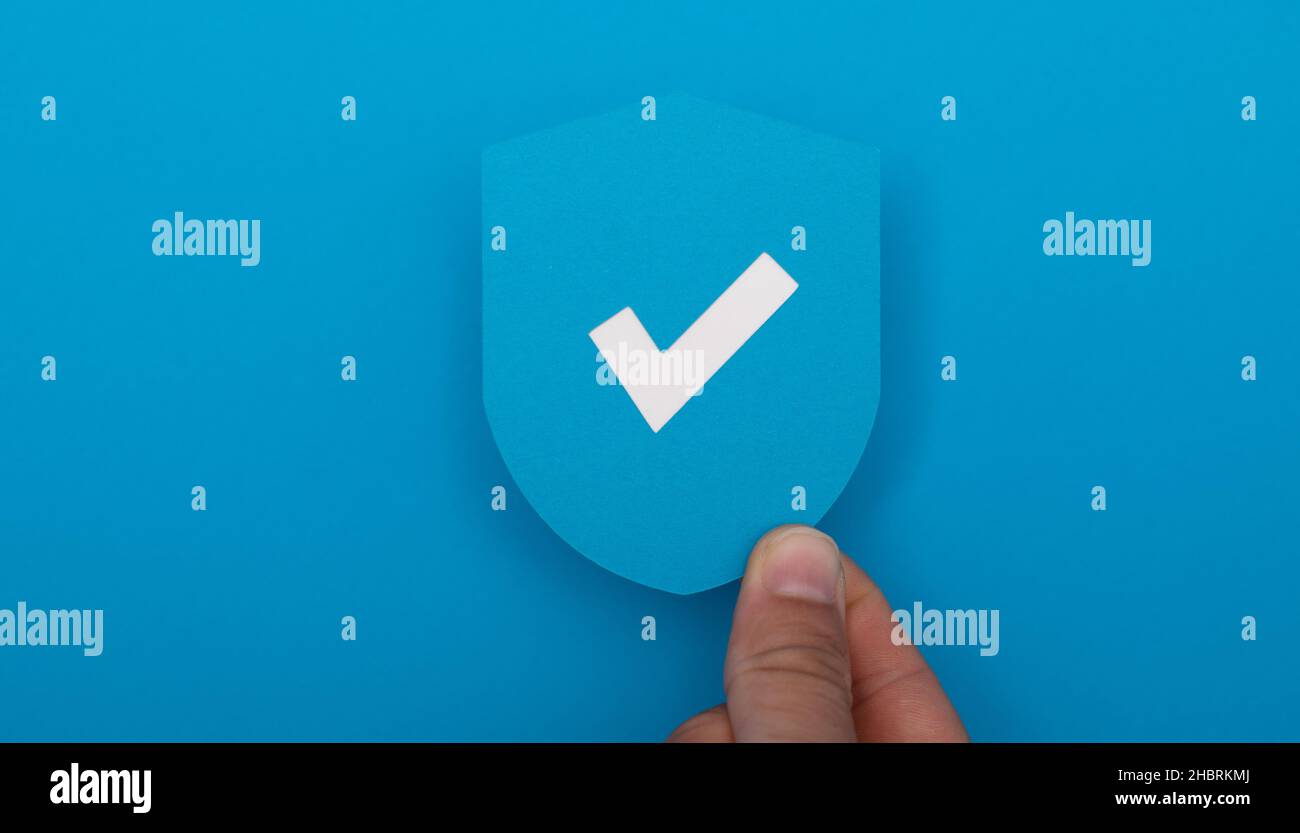 A blue shield sign representing information protection with firewall ...