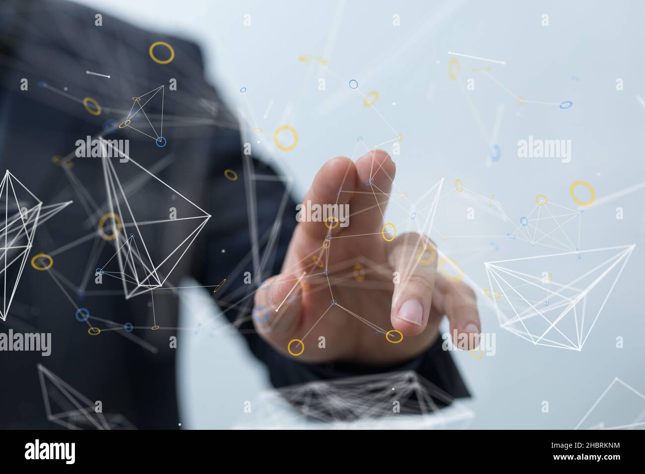 Interconnected geometric patterns in front a human hand / Unity group ...