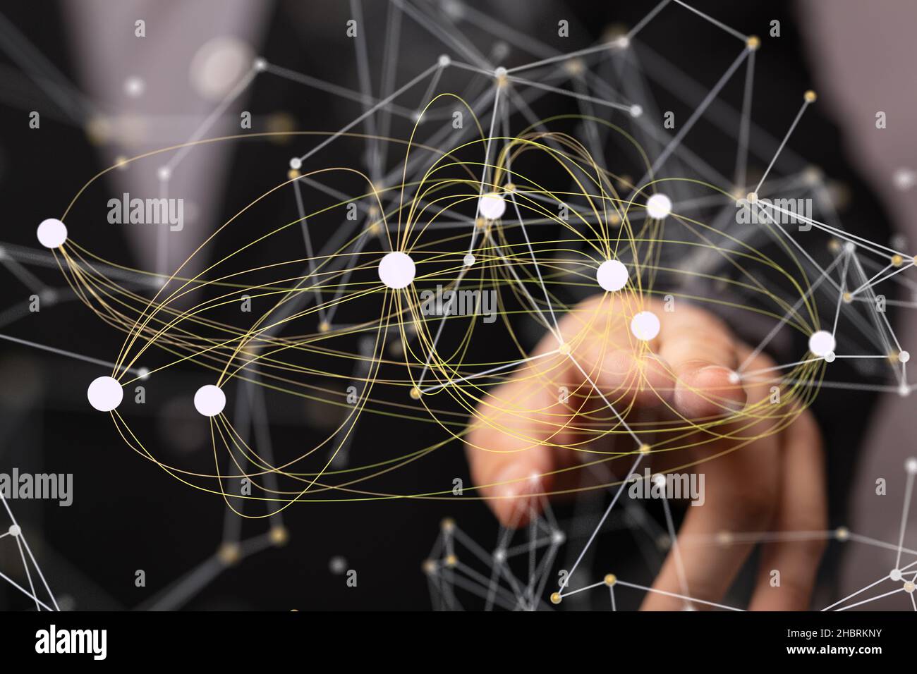 Interconnected icons in front a human hand / Unity group and teamwork ...