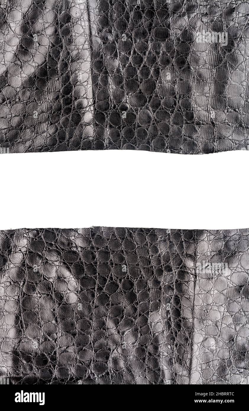 Two pieces of black artificial leather with a space for text isolated ...