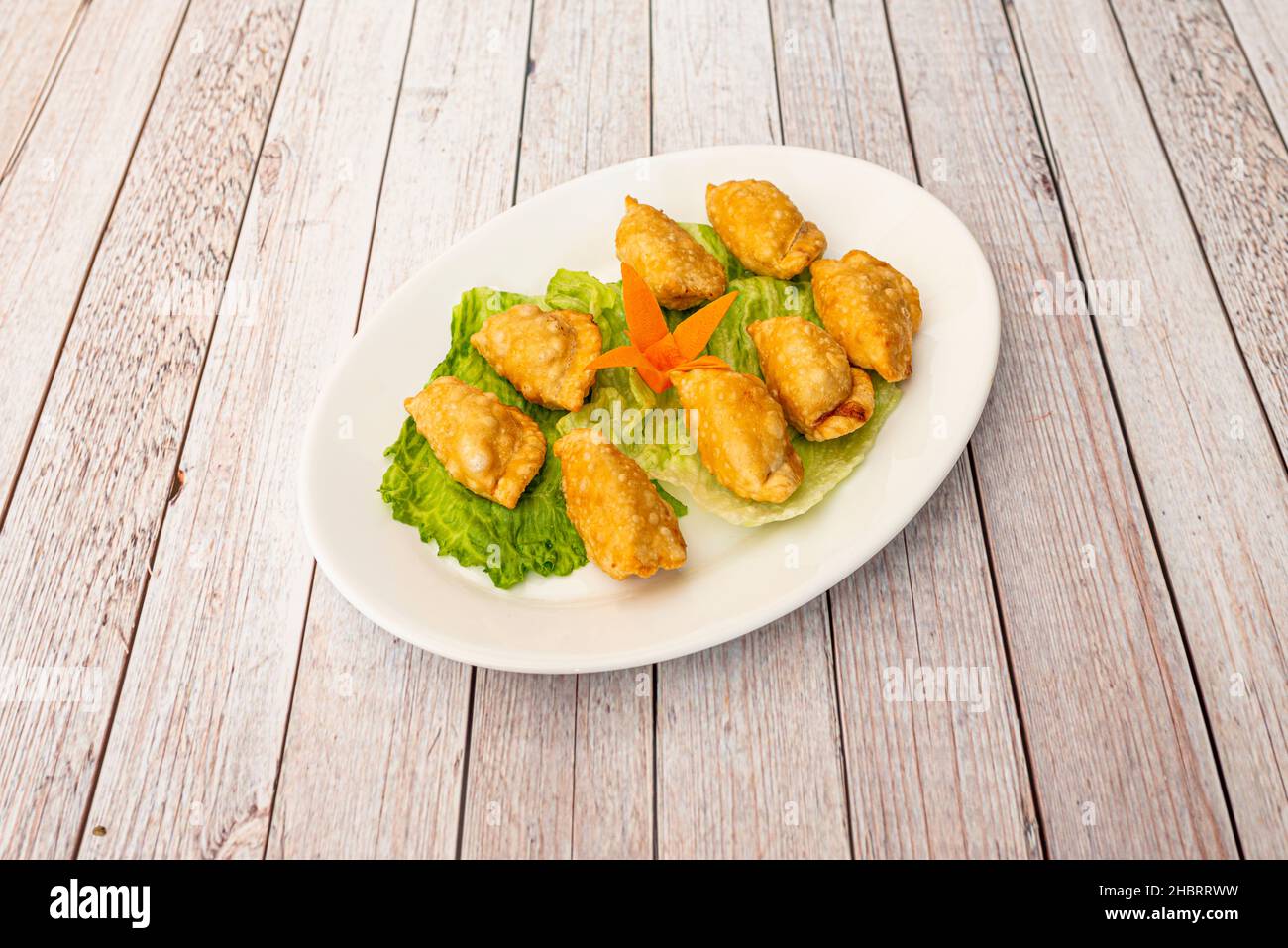 A jiaozi and also known as mandu, is a type of dumpling or ravioli ...