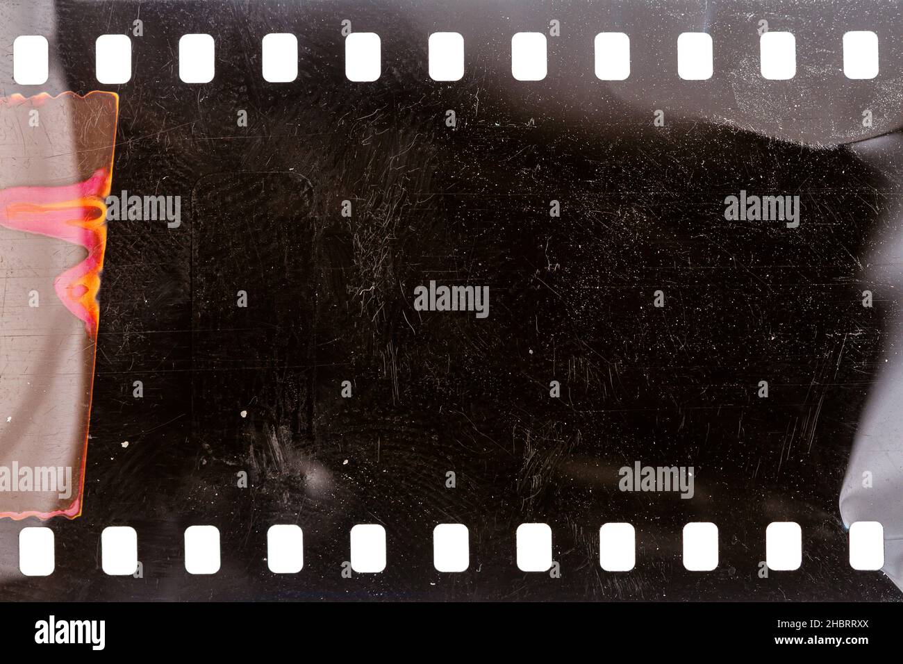 Dusty and grungy 35mm film texture or surface. Perforated scratched ...