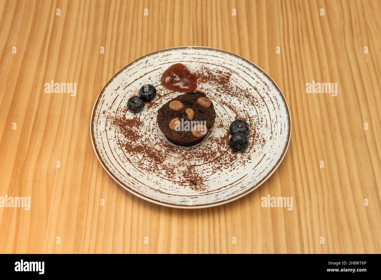 A brownie, typical of the United States. It is named for its dark brown ...