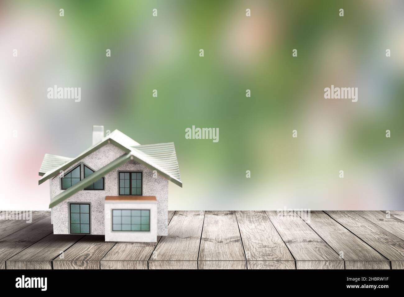 Small white cardboard houses on white background. Handmade home. Do it ...