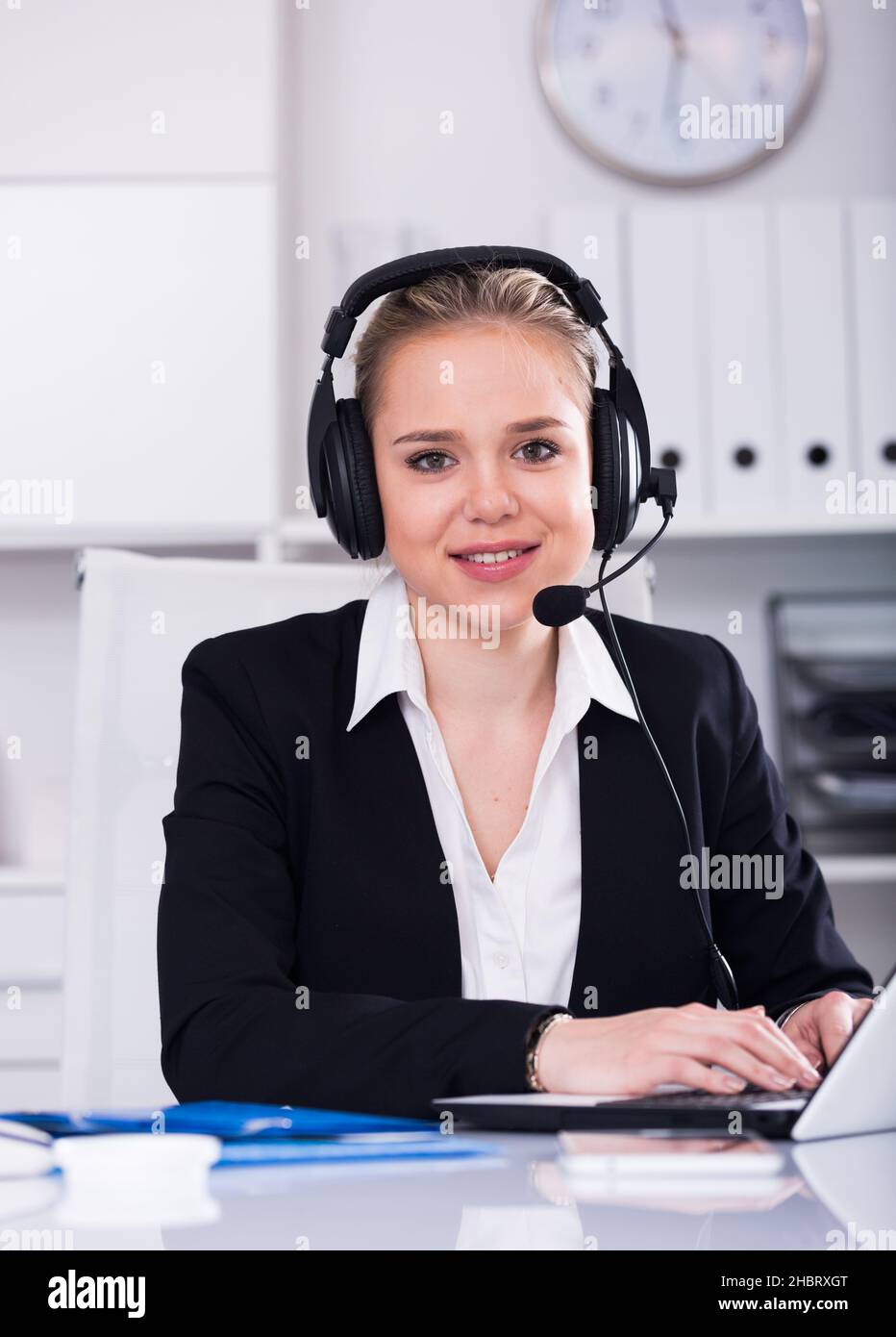 Female call center operator working Stock Photo - Alamy