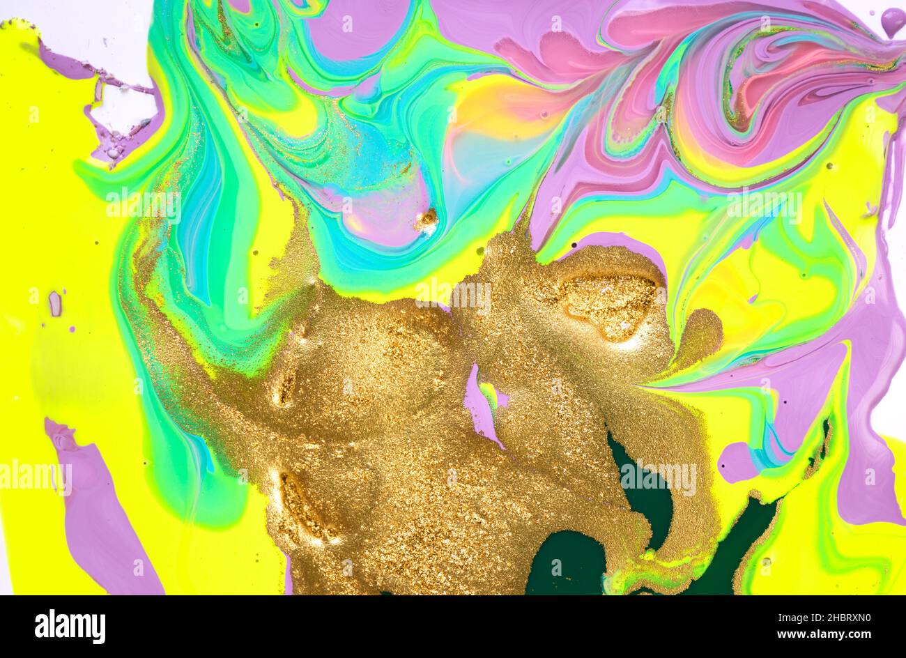 Mix of acrylic vivid colorful inks with gold dust Stock Photo - Alamy