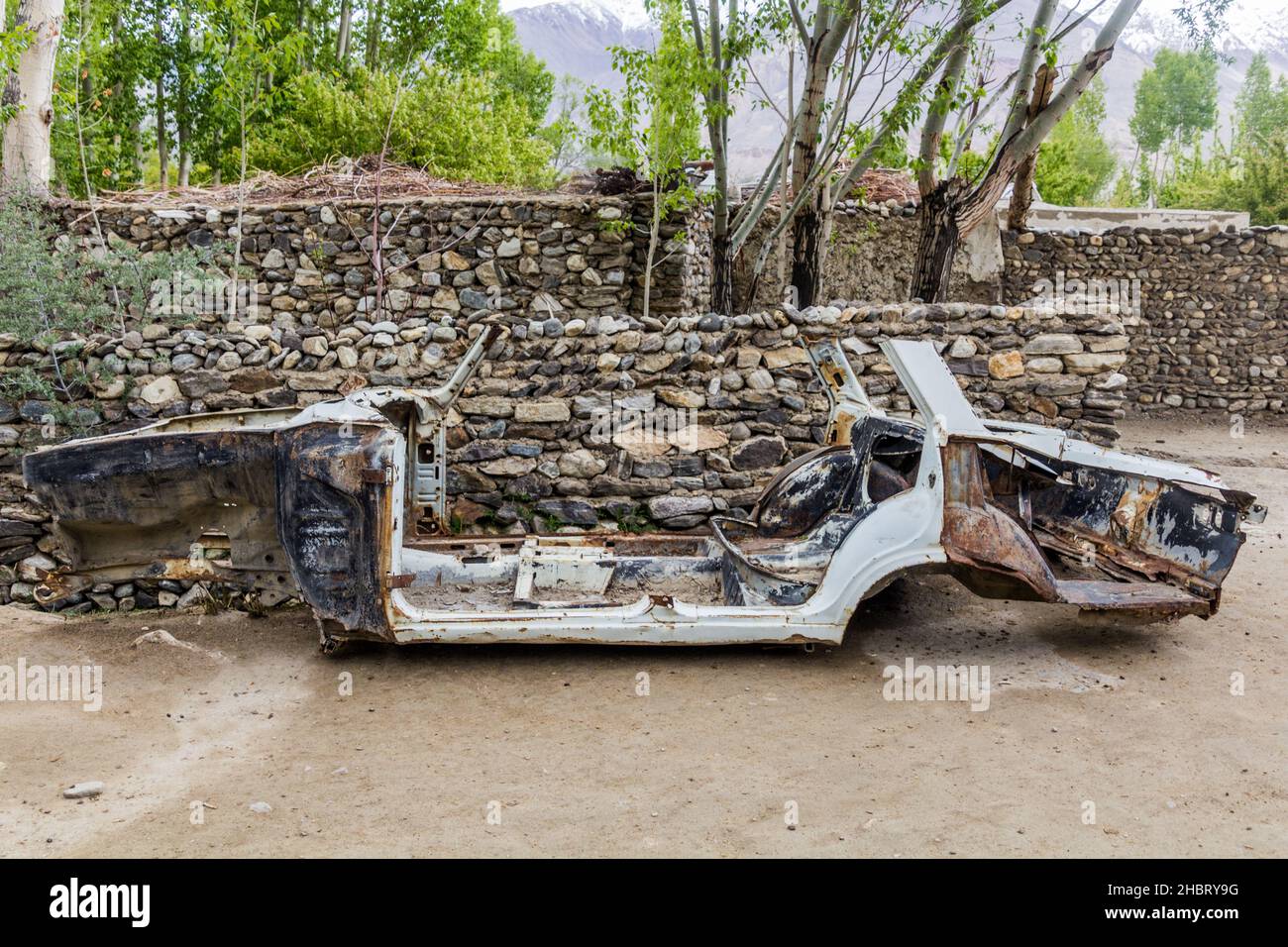 Car wreck in Vrang village in Wakhan valley, Tajikistan Stock Photo - Alamy