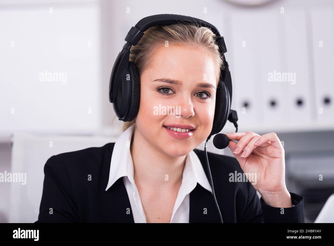 Female call center operator working Stock Photo - Alamy