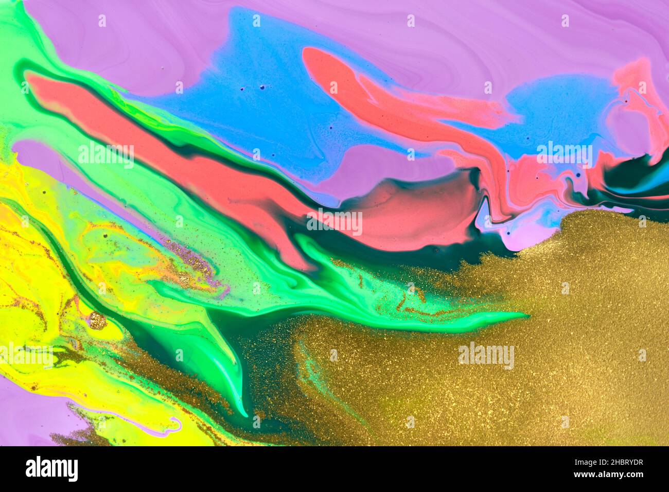 Abstract fluorescent ink mix with gold dust Stock Photo - Alamy