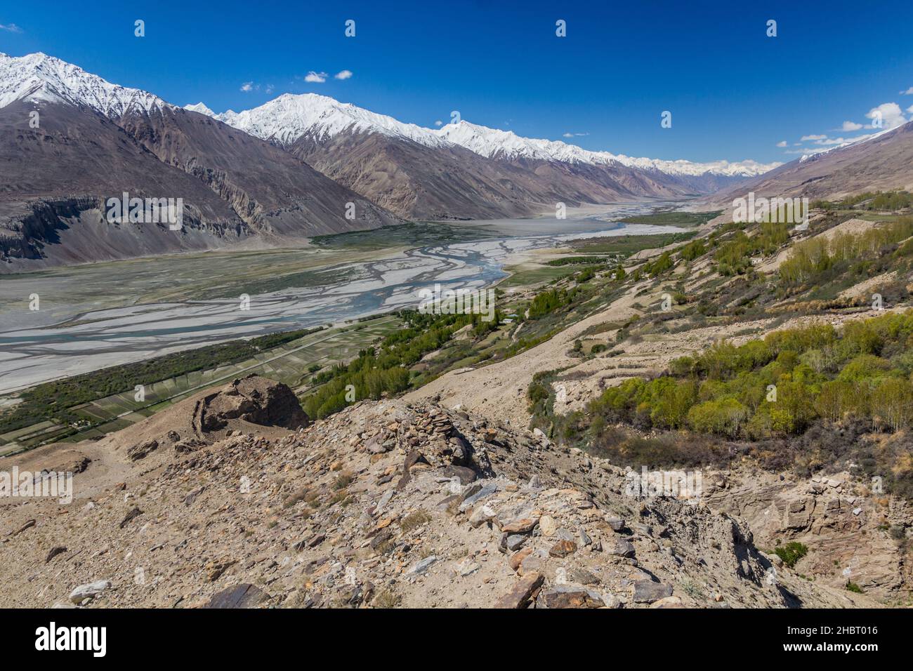 Wakhan valley with Panj river between Tajikistan and Afghanistan Stock ...
