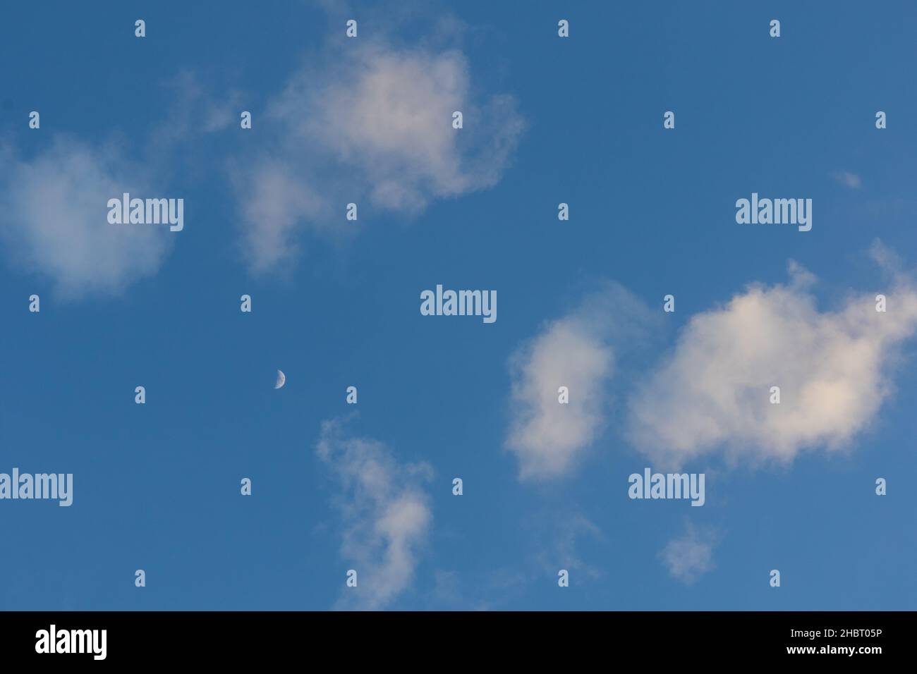 Pattern of clouds forming in blue sky creating an abstract background ...