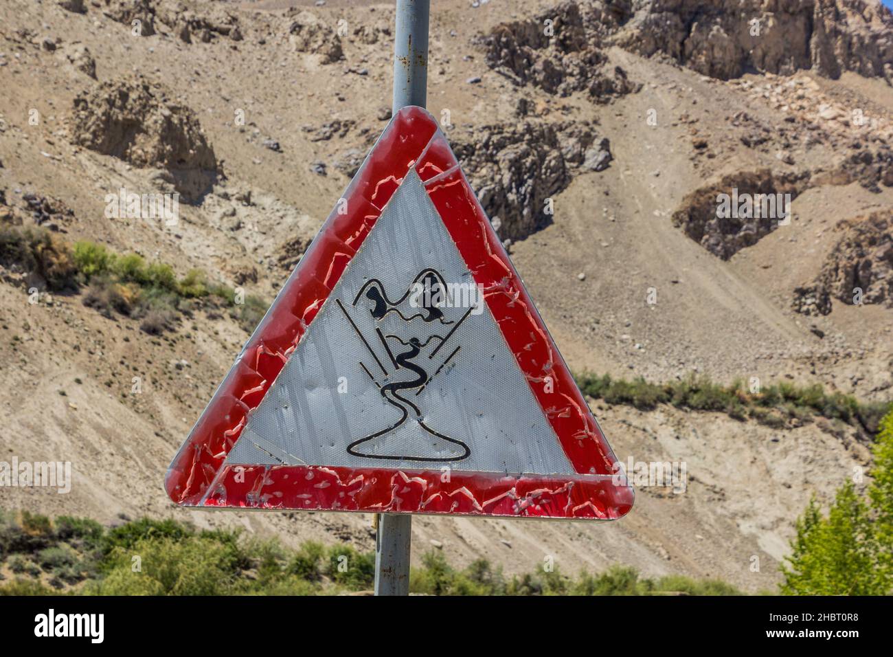 Flash flooding sign in Wakhan valley, Tajikistan Stock Photo - Alamy