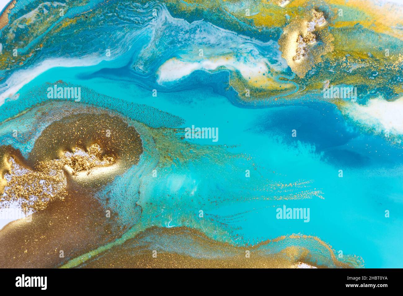 Abstract liquid paints with gold dust texture Stock Photo - Alamy