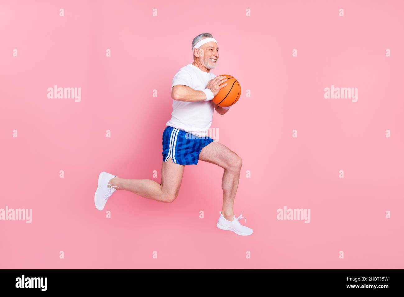 Full length body size side profile photo senior man jumping up playing ...