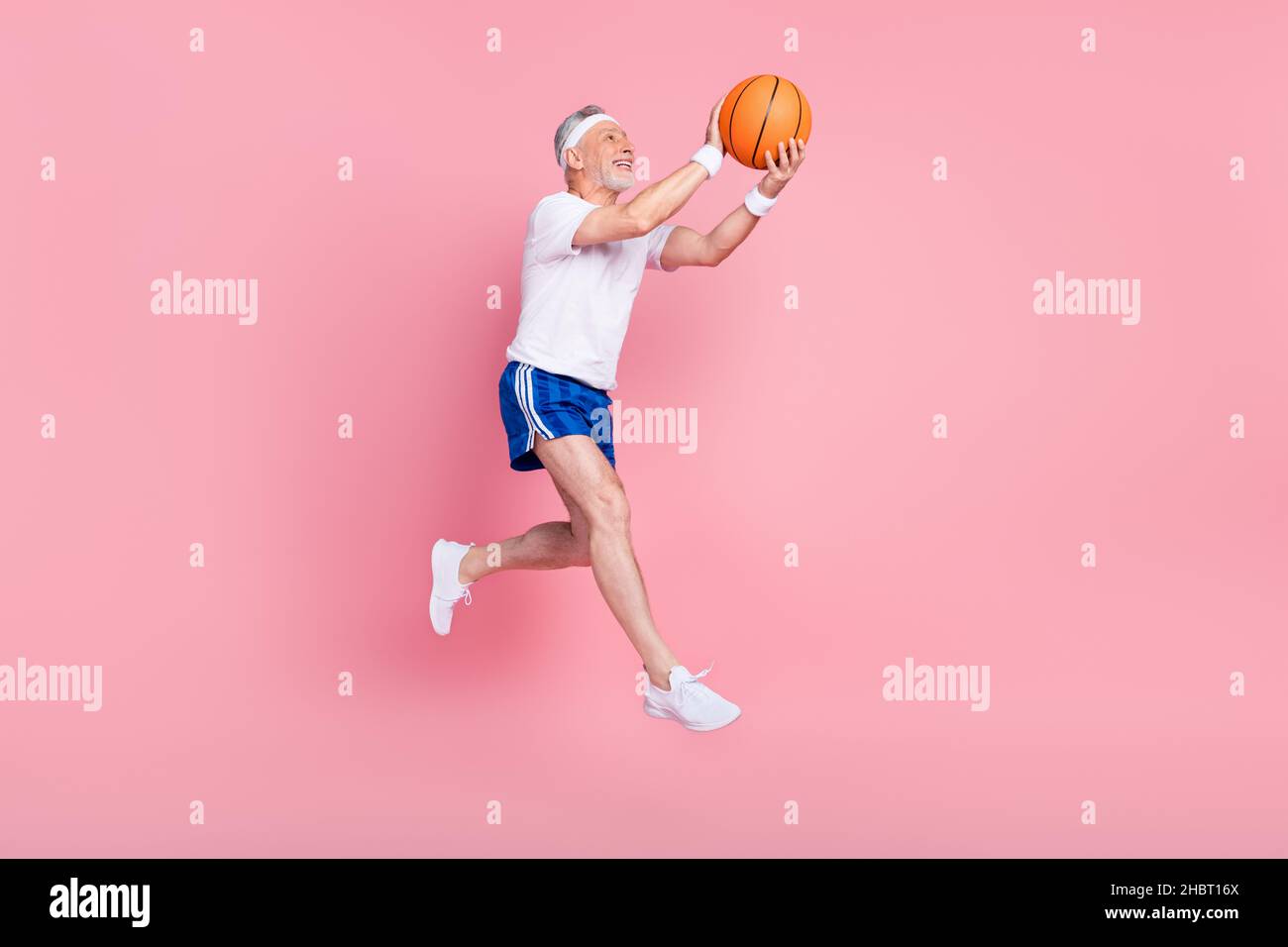 Full length body size side profile photo senior man jumping up playing ...