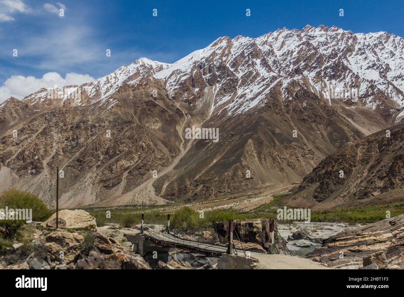 Small bridge in Gunt river valley in Pamir mountains, Tajikistan Stock ...