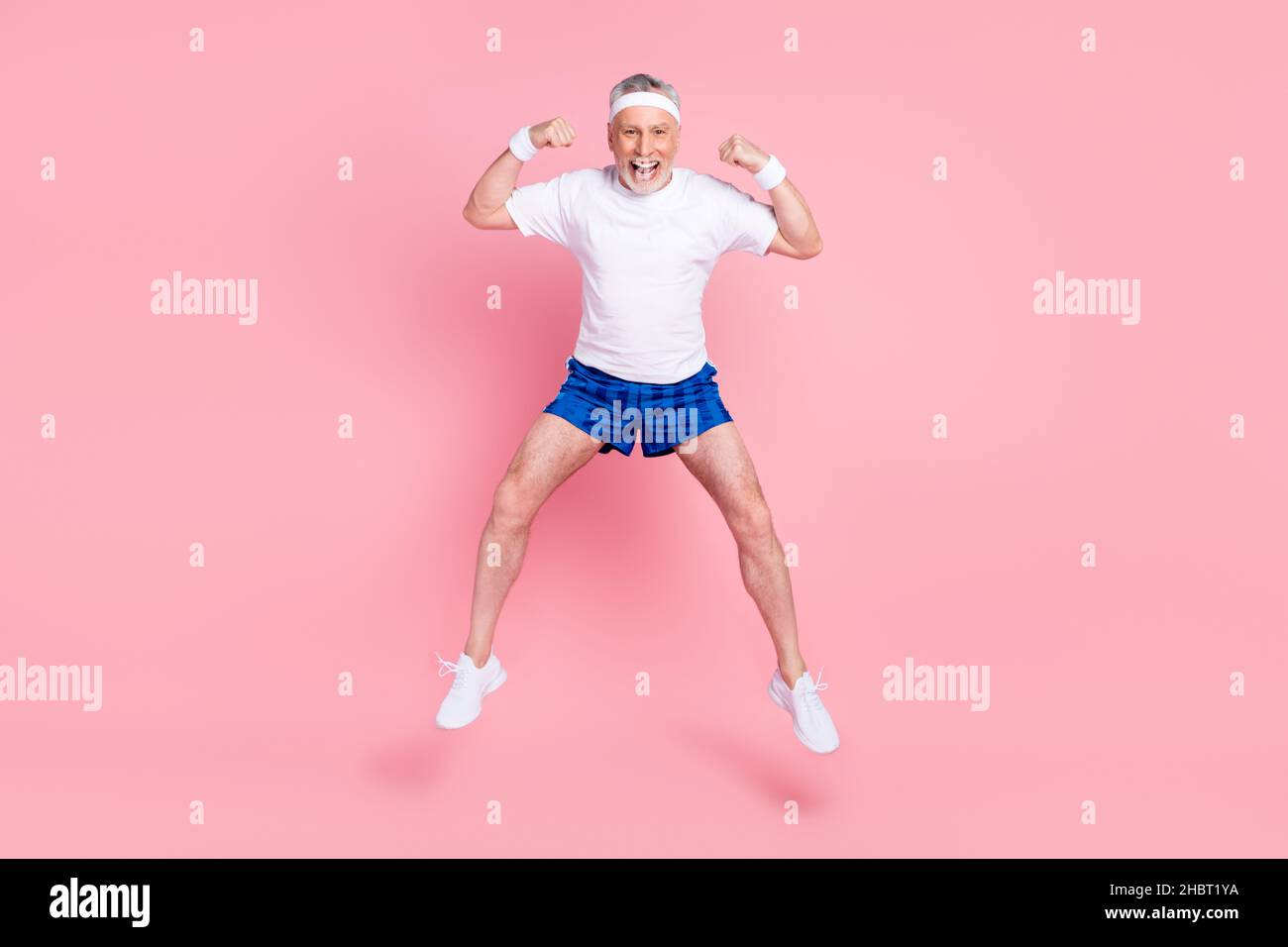 Full length body size photo man jumping showing strong muscles isolated ...