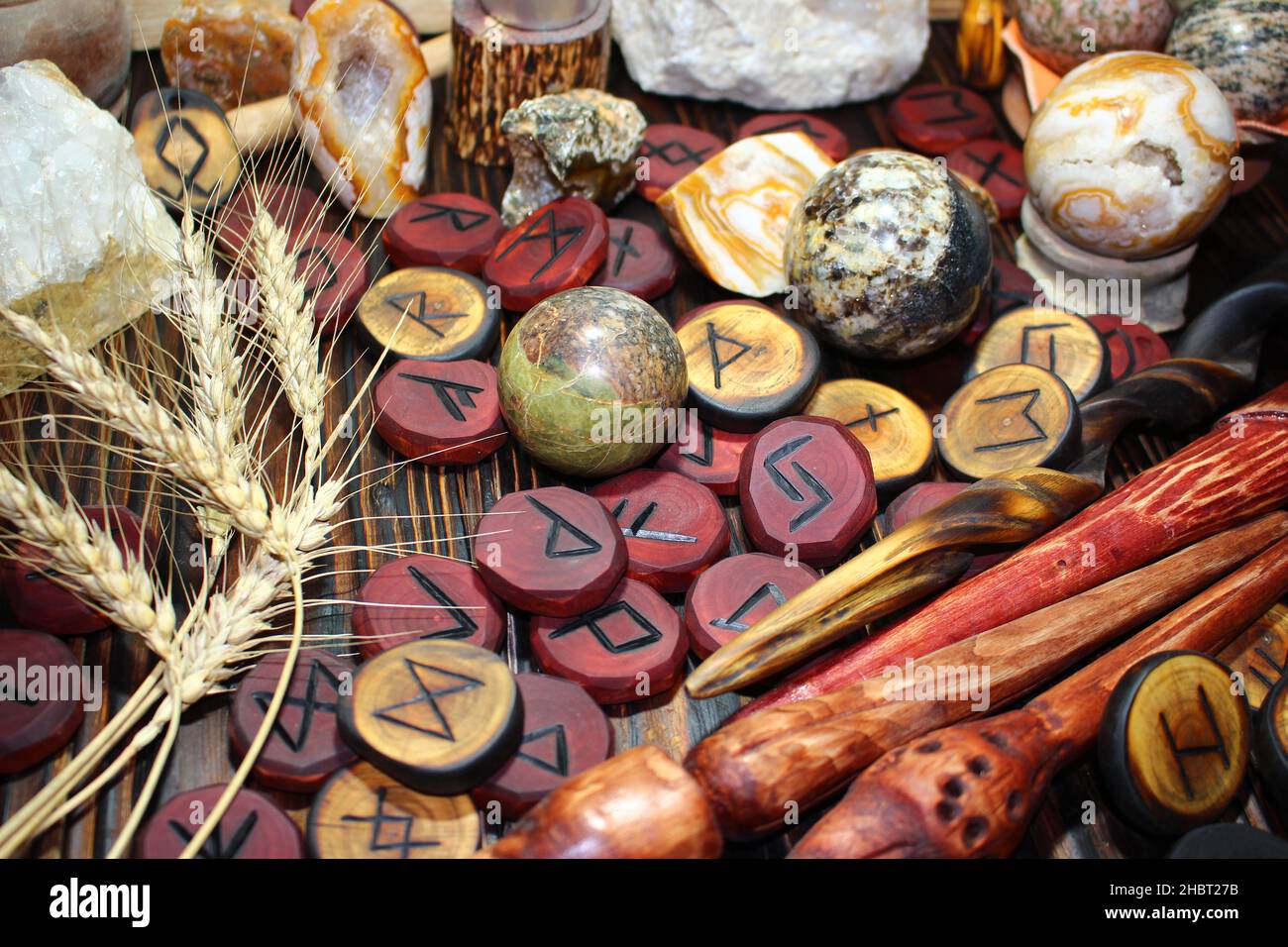 Witching still life of carved Scandinavian runes and crafted stones ...