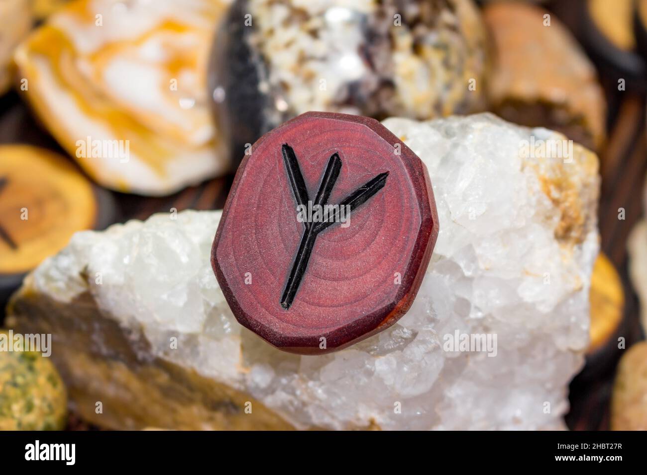 Rune Algiz (Elhaz) carved from wood - Elder Futhark Stock Photo - Alamy