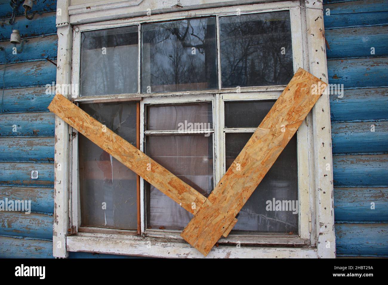 Boarded up window in an old house Stock Photo - Alamy